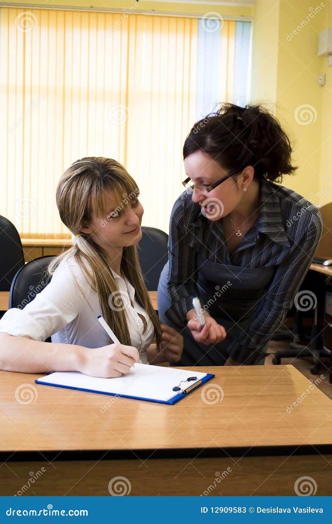 Helpful teacher stock image. Image of school, read, eyes - 12909583
