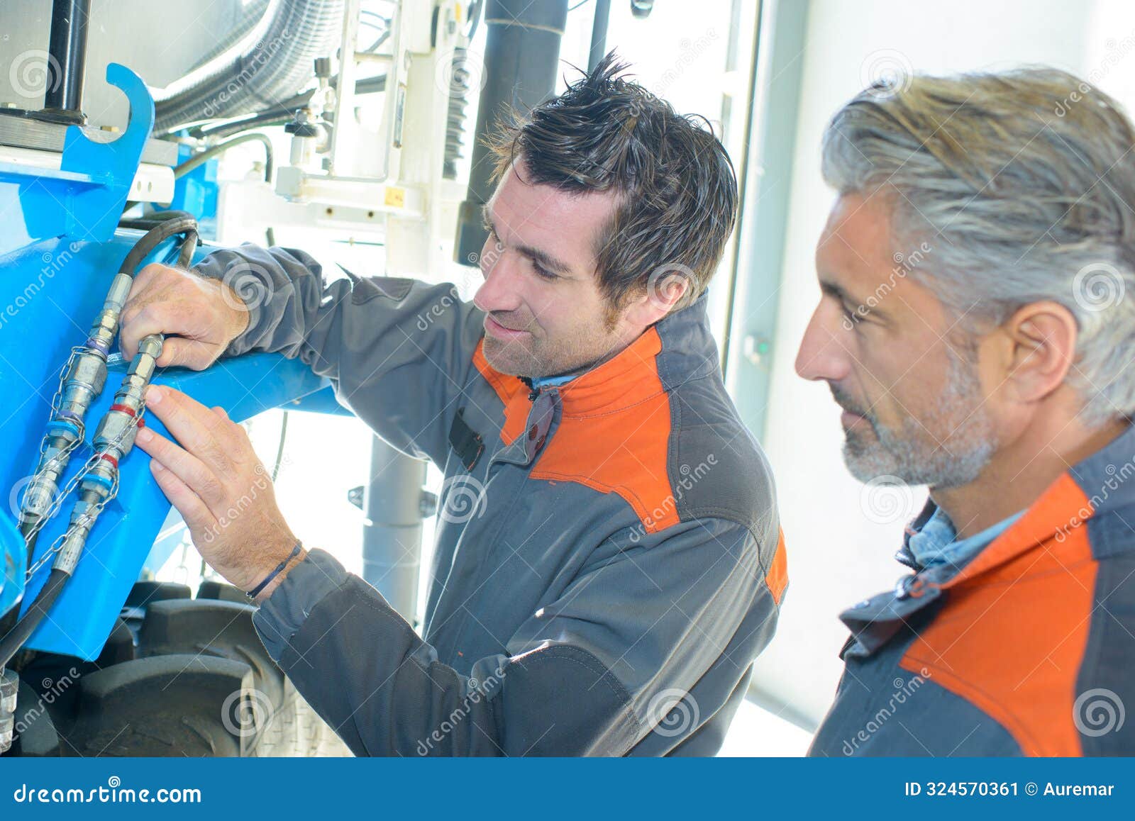 He helping colleague stock image. Image of technician - 324570361