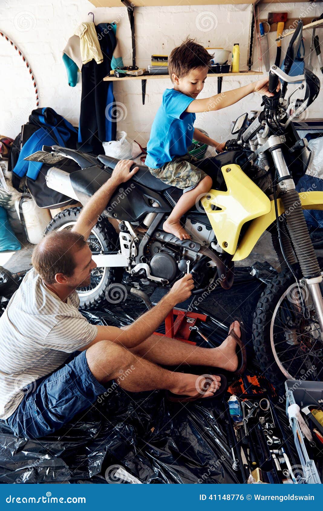 Helping dad with tools stock photo. Image of family, handyman - 41148776