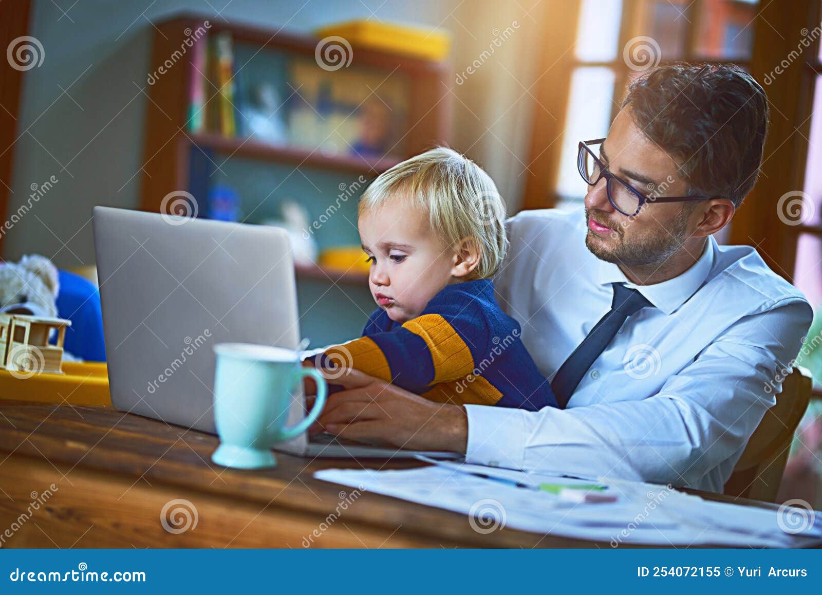 Helping Daddy with His Work. a Single Father and His Son Using a Laptop ...