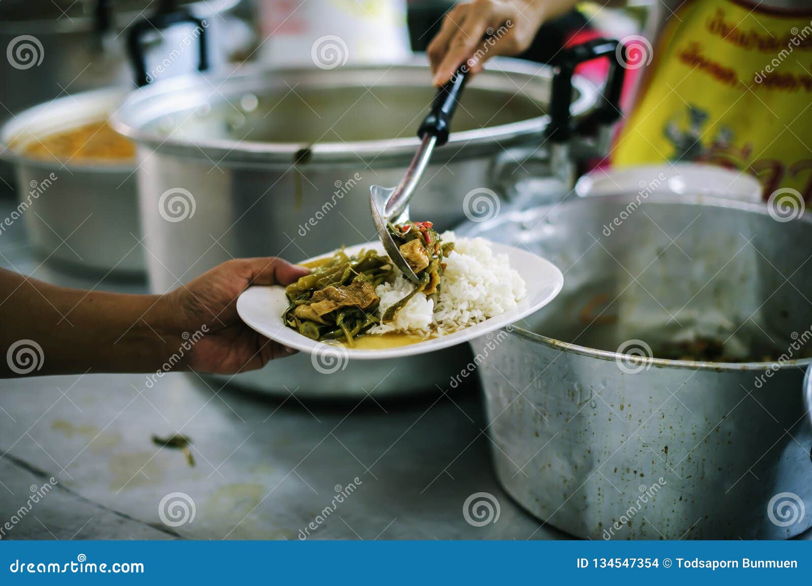 Helping Feed the Poor : the Concept of Hunger Stock Photo - Image of ...