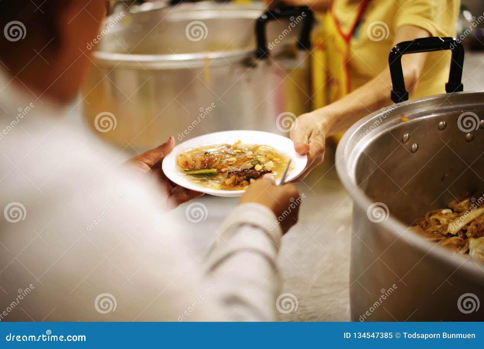 Helping Feed the Poor : the Concept of Hunger Stock Image - Image of ...