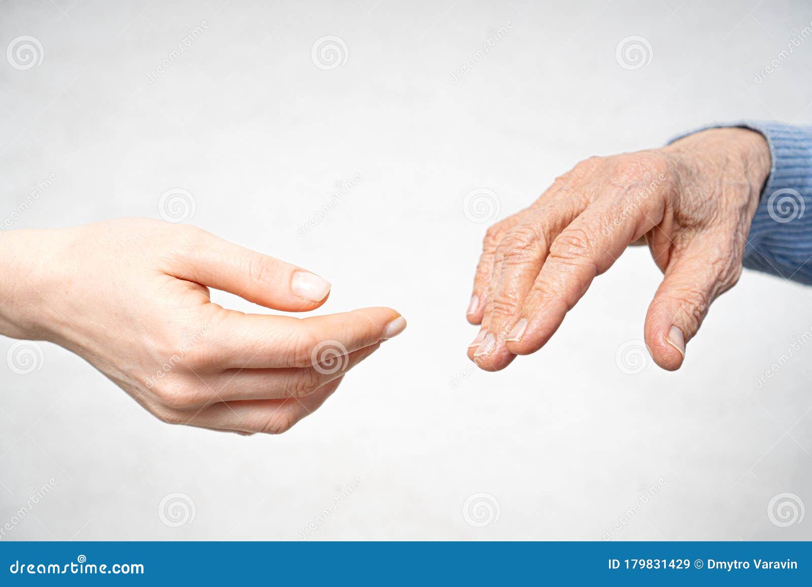 Helping Hand for the Elderly Concept with Young Hand and Old Hand Stock ...