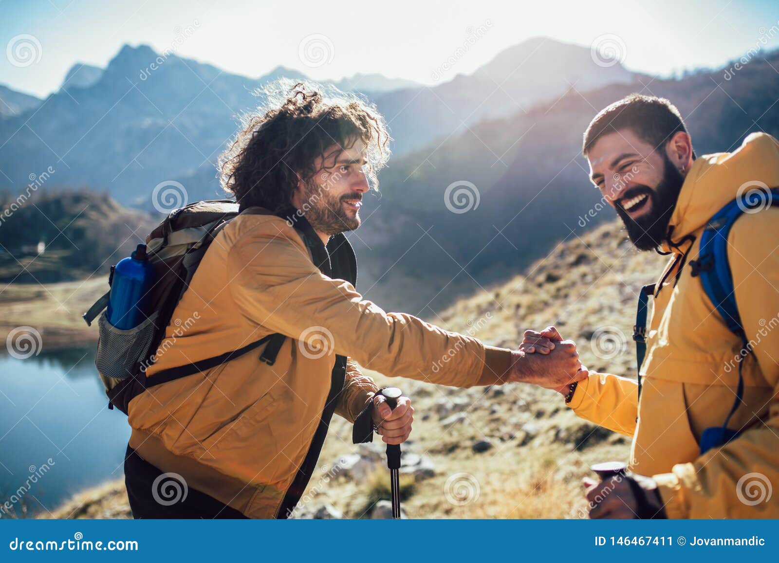 Hiker Man Getting Help on Hike Happy Overcoming Obstacle Stock Image ...