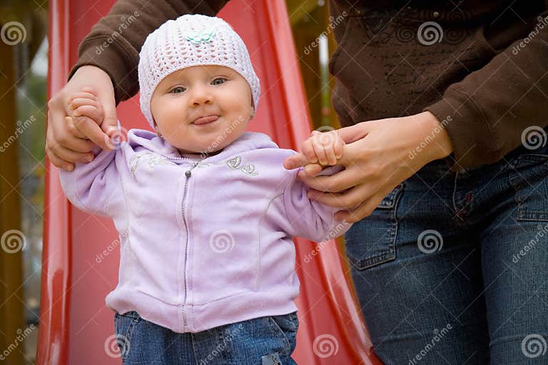 Helping hands for baby stock image. Image of smile, parent - 18125333