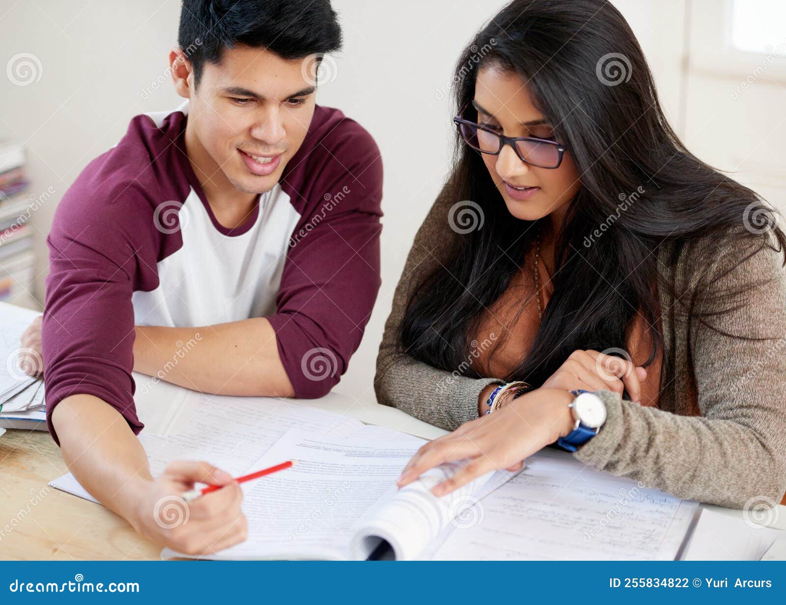 Helping Her Prep for the Exams. Two University Students Studying. Stock ...