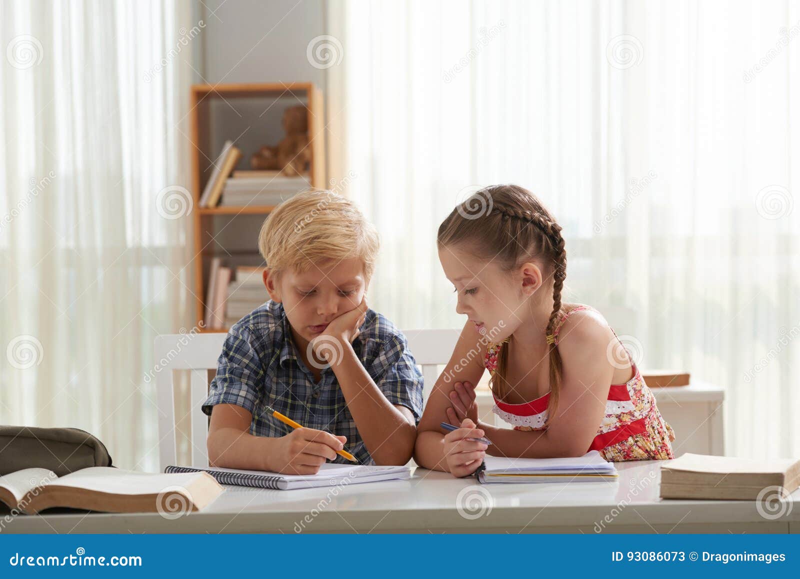 Helping with homework stock image. Image of writing, texbook - 93086073