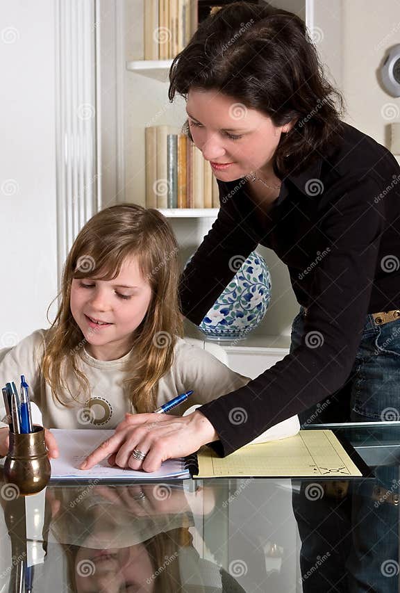 Helping mom stock image. Image of read, learning, parent - 5438497