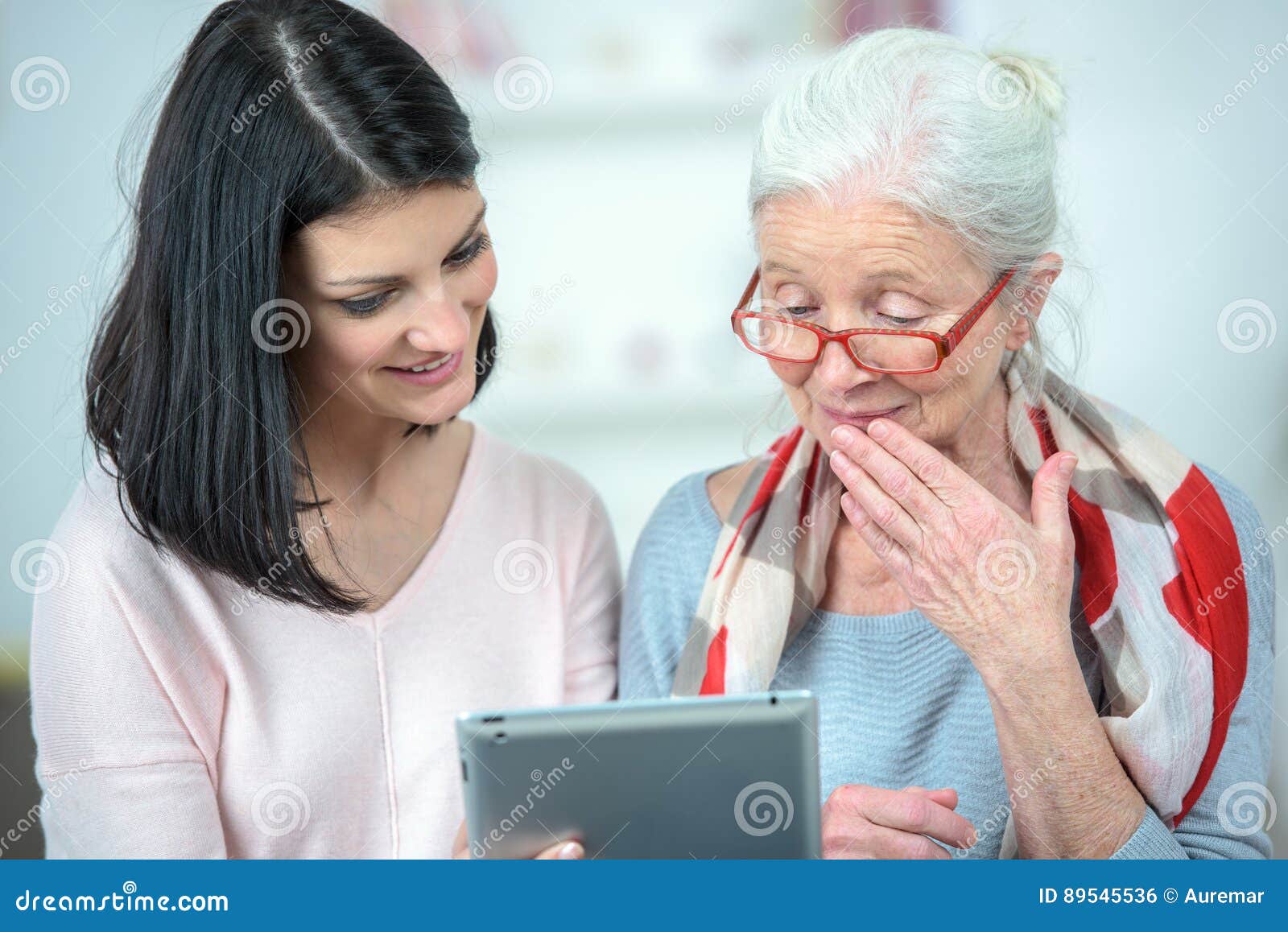 Helping Old Woman Use Tablet Computer Stock Photo - Image of tablet ...