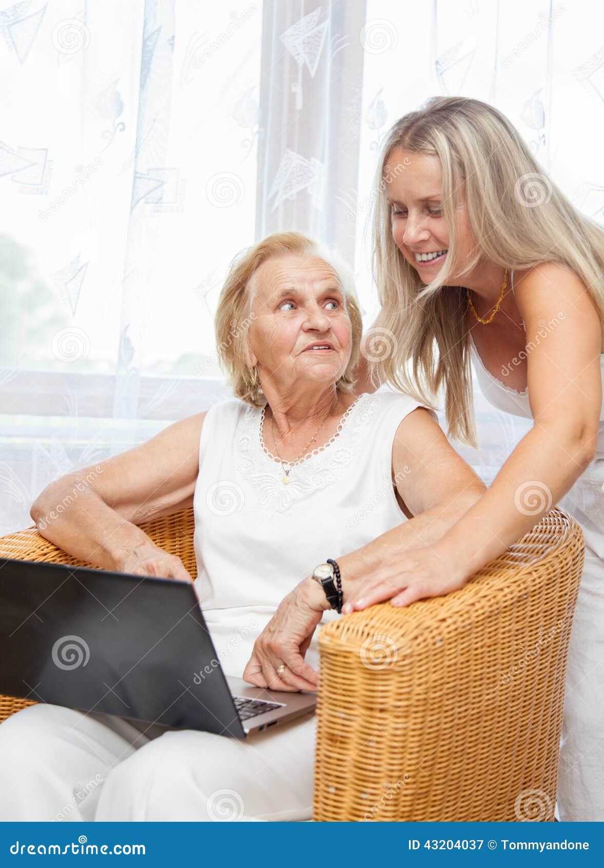 Helping Out with New Technology Stock Image - Image of carer, home ...