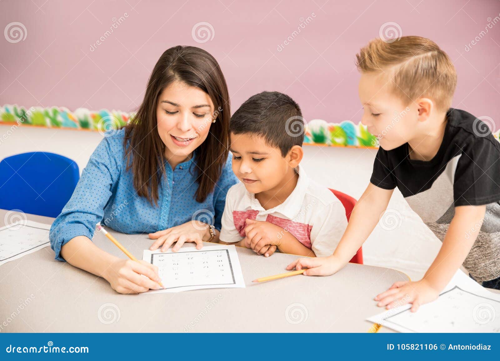 Helping Students with Math Exercise Stock Photo - Image of lifestyle ...