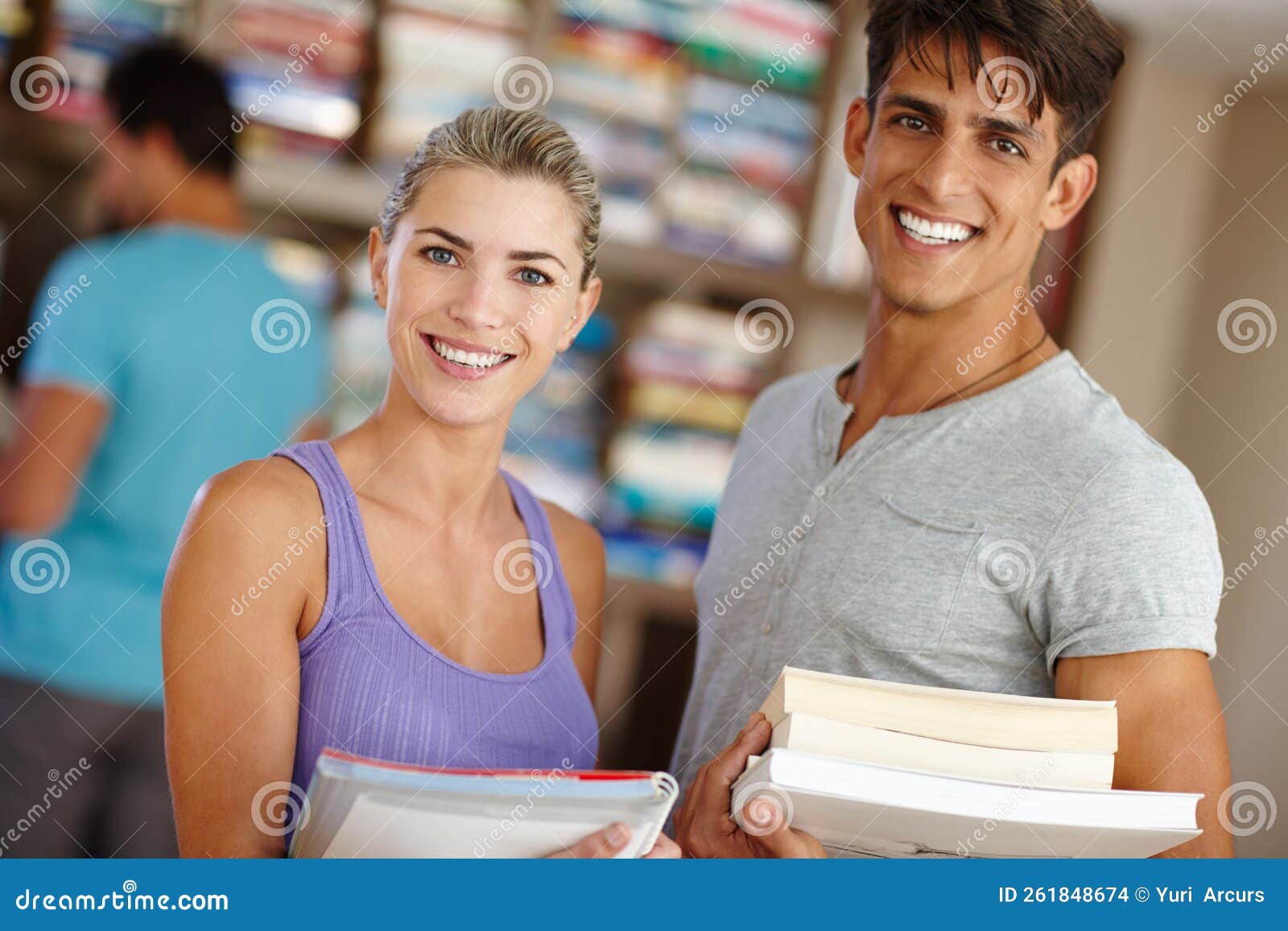 It Helps To Have a Study Partner. Two College Students Standing in the Library with Their ...