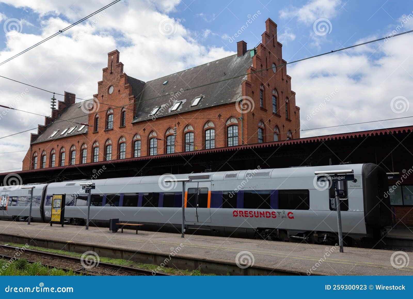Helsingor Train Station with a Train and a Brick Building in Denmark ...