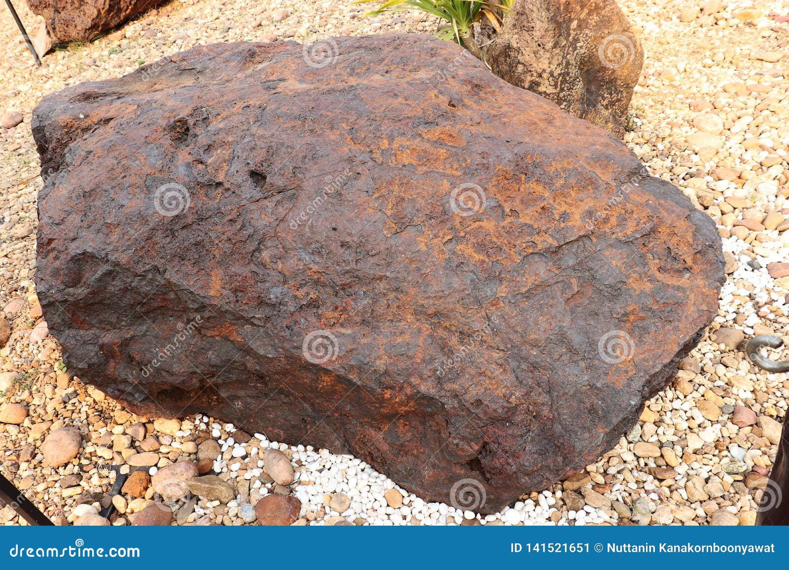 Hematite stone on ground stock image. Image of colored - 141521651