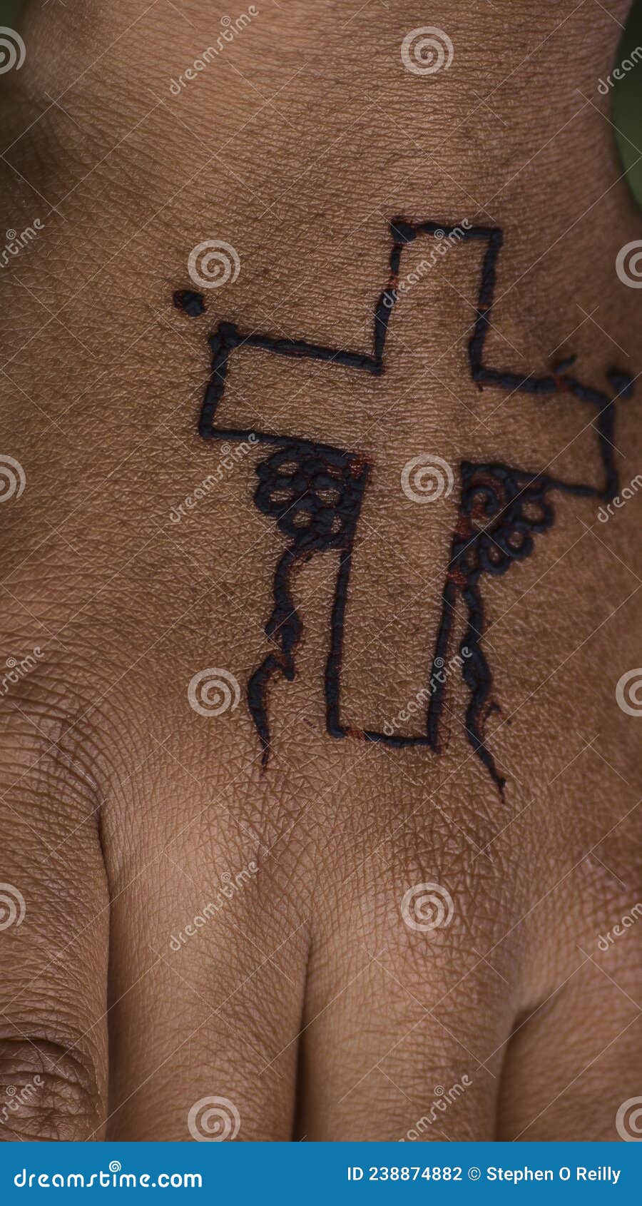 Henna Ink Cross Painted on Hand Stock Photo - Image of painted, henna ...