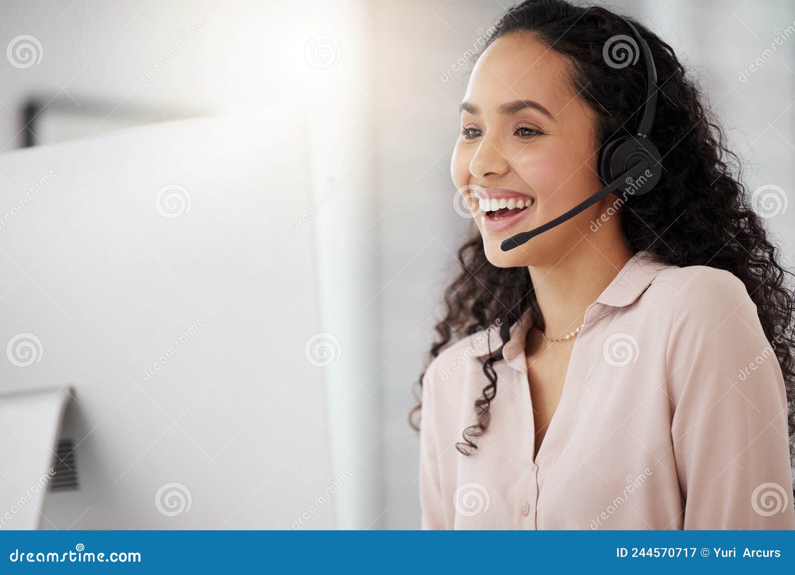 Her Interaction with Customers is always Positive. Shot of a Young Call ...