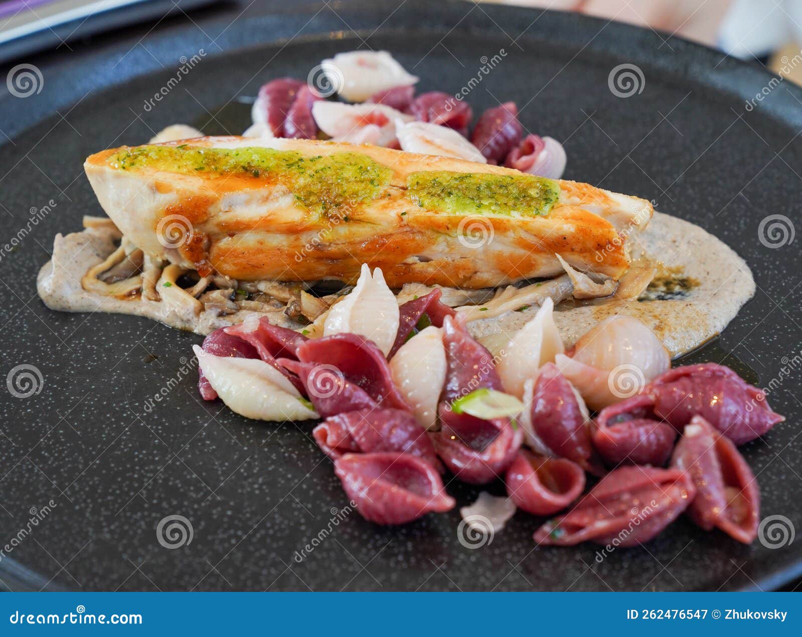 Herb Crusted Chicken Supreme with Handcrafted Regional Pasta Stock ...