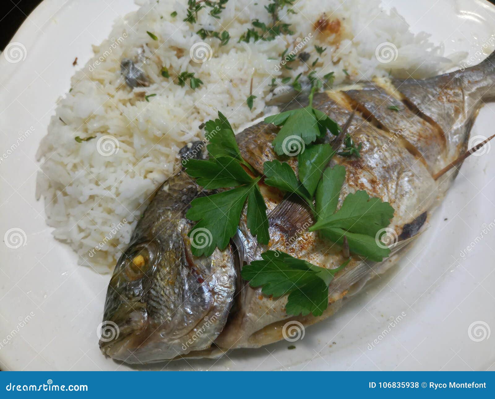 Crispy Cooked Sea Bream and Rice Stock Photo - Image of cooked, crispy ...