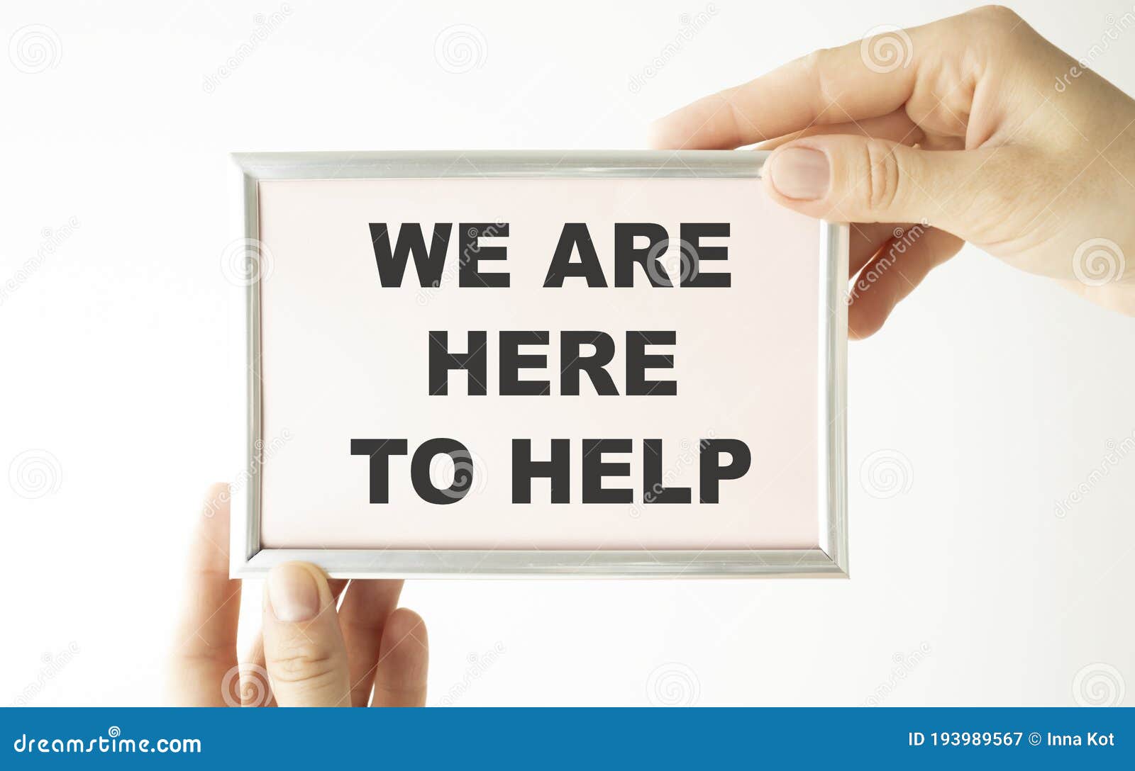 We are HERE TO HELP Written on a White Sheet Held by a Person. Stock ...