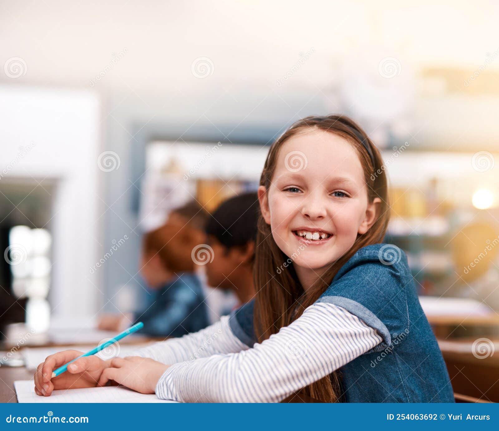 Here To Learn. Portrait of a Cheerful Young Elementary School Kid ...