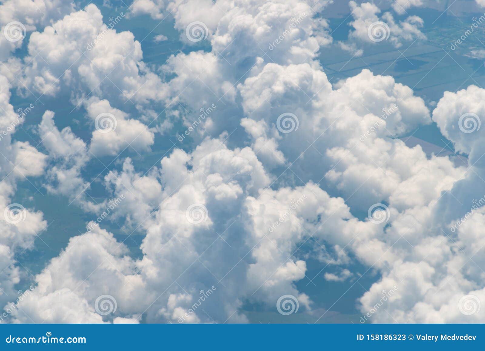 View from an Airplane on the Ground, Clouds Field and Blue Sky. Cloud ...