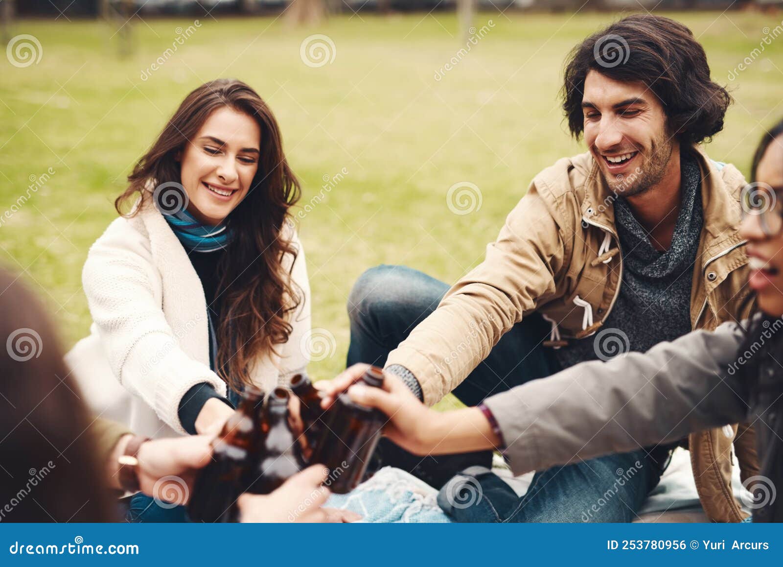 Heres To Many More Memories Together A Group Of Cheerful Young Friends