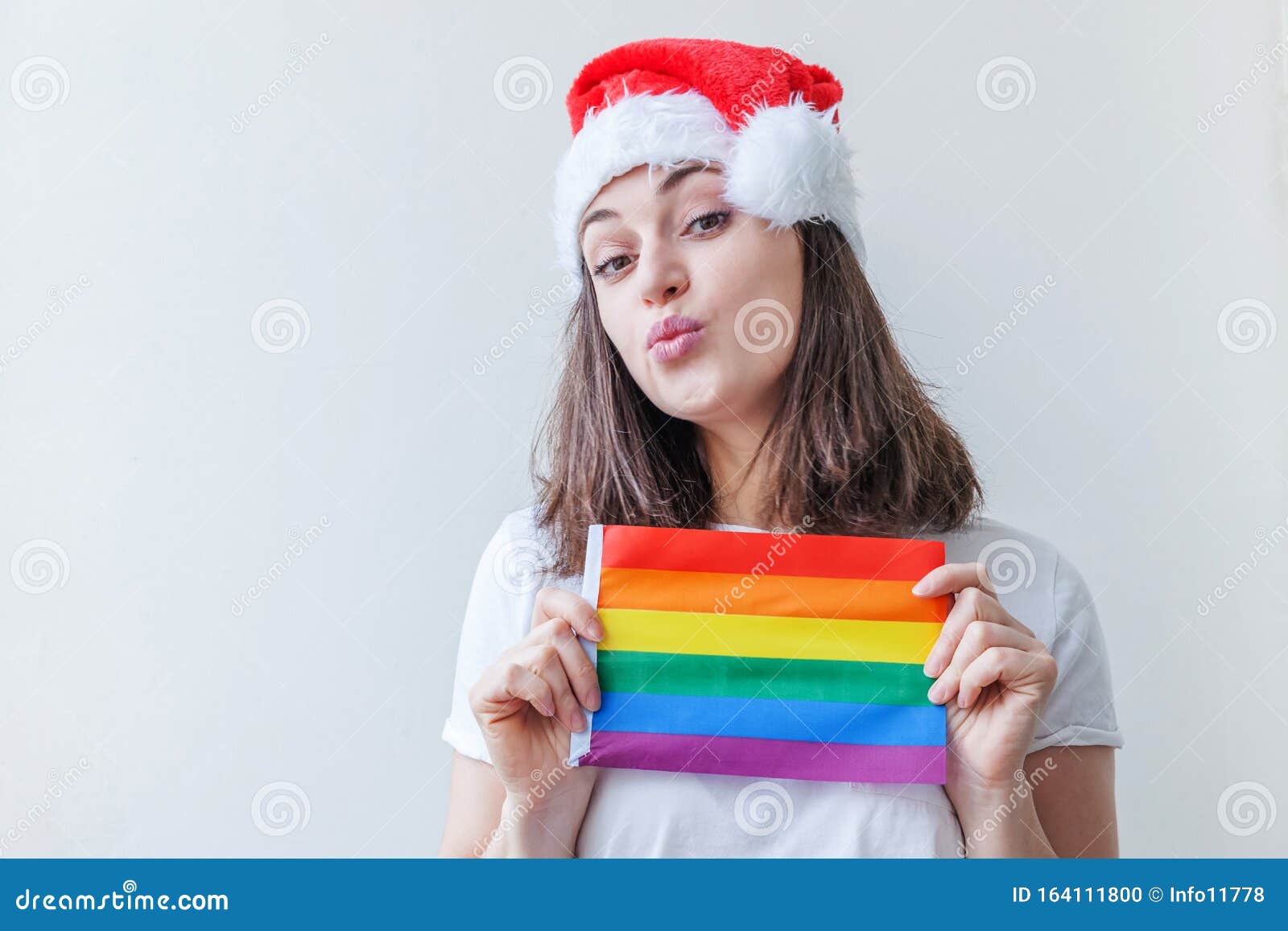 Hermosa Chica Lesbiana Con El Sombrero Rojo De Santa Claus Con La