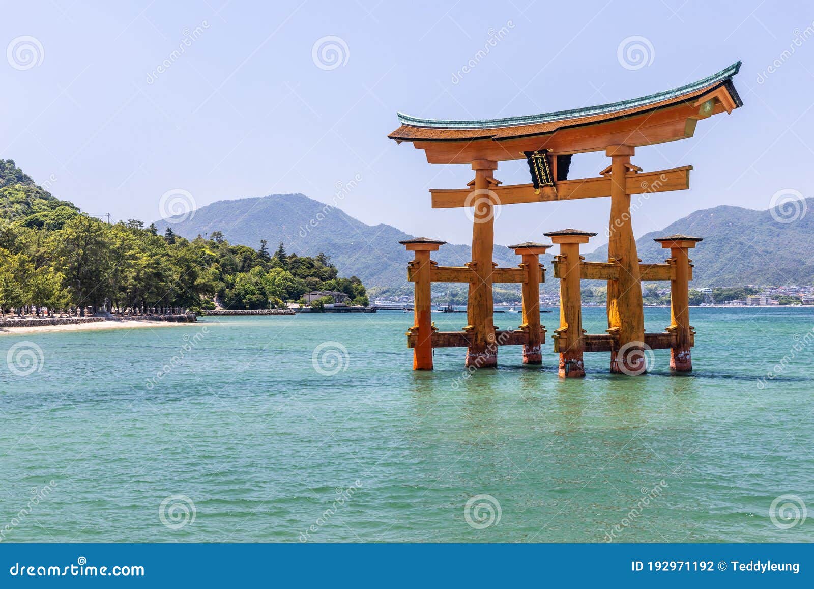 Heron in Front of the Floating Tori Gate Stock Photo - Image of coast ...