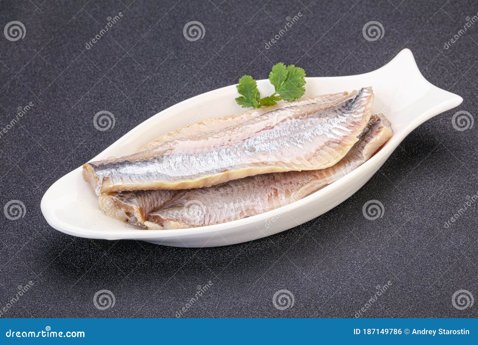 Herring fillet in the bowl stock photo. Image of white - 187149786