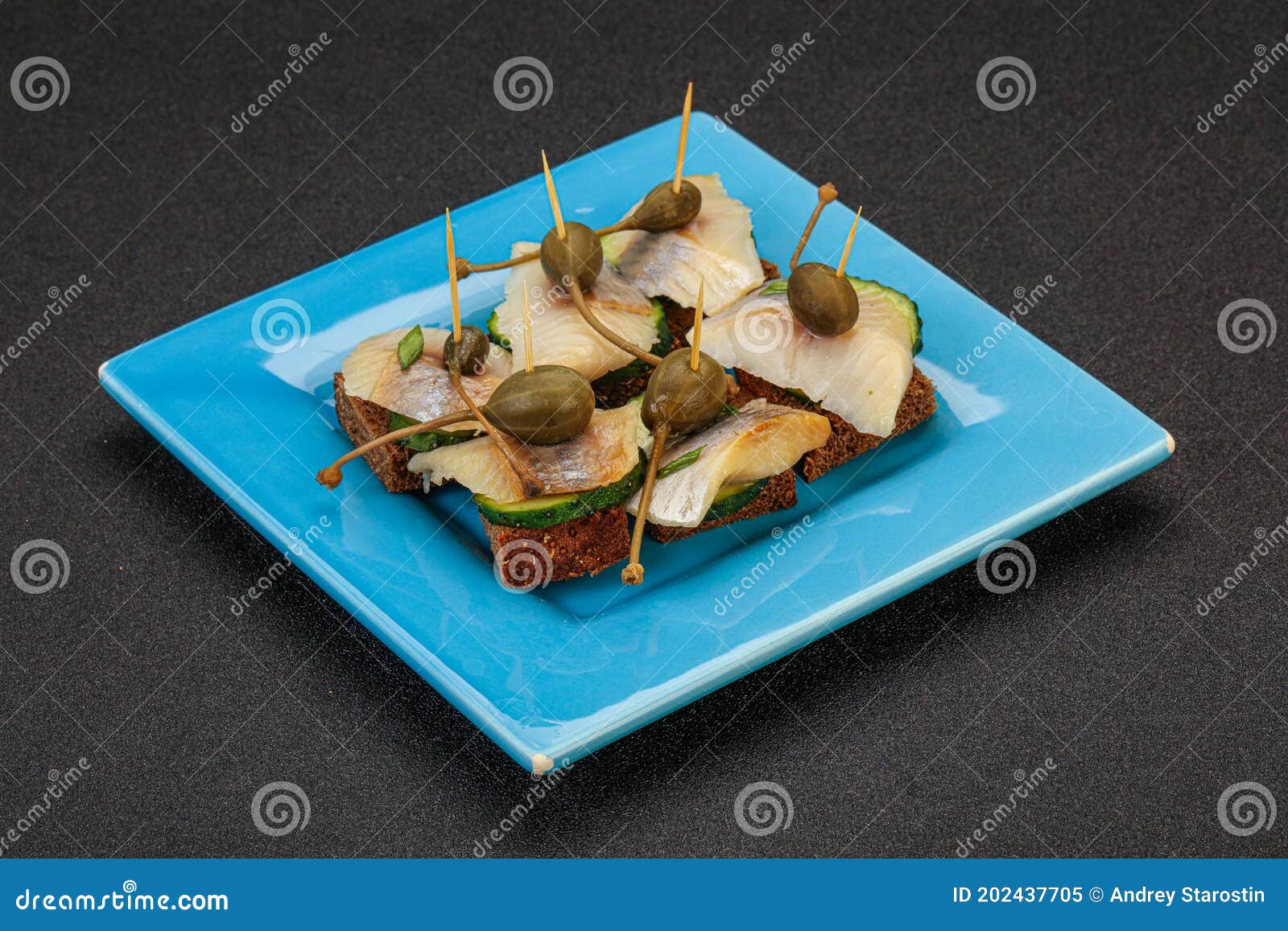 Herring Fillet Canape with Caperberry Stock Image - Image of black ...