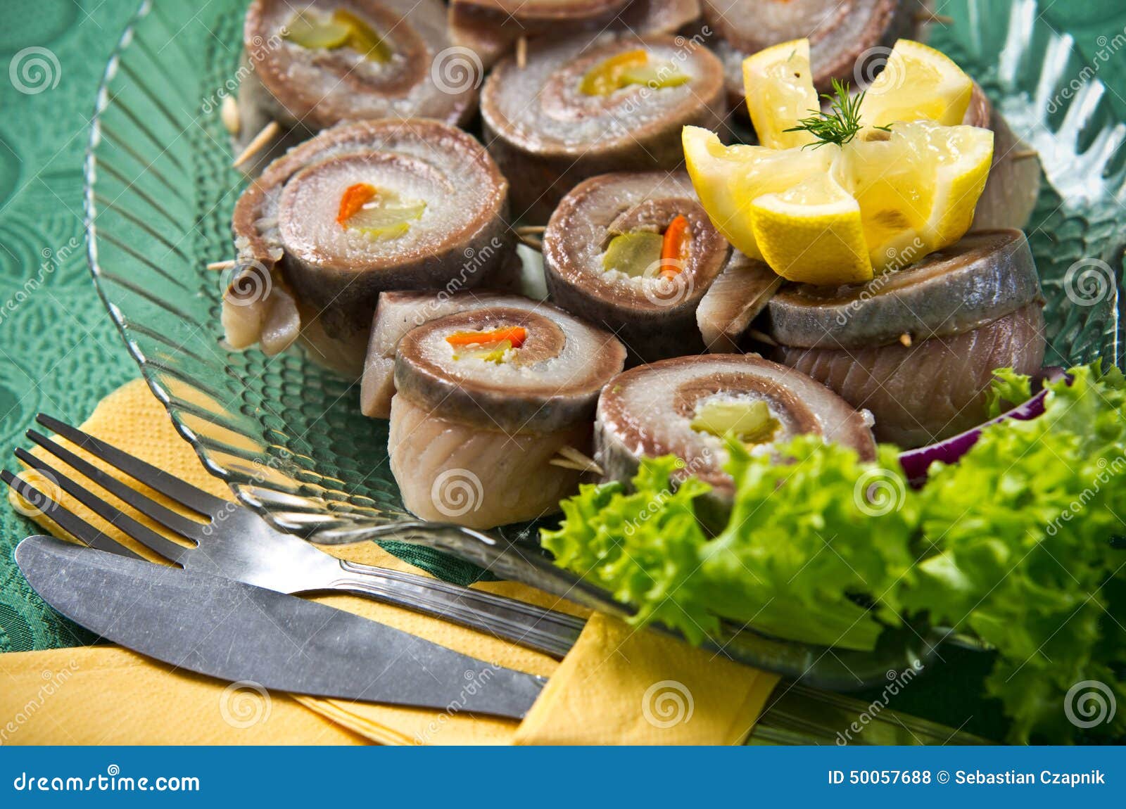 Herring Rolls on Buffet Dish Stock Photo - Image of utensils, garnish ...