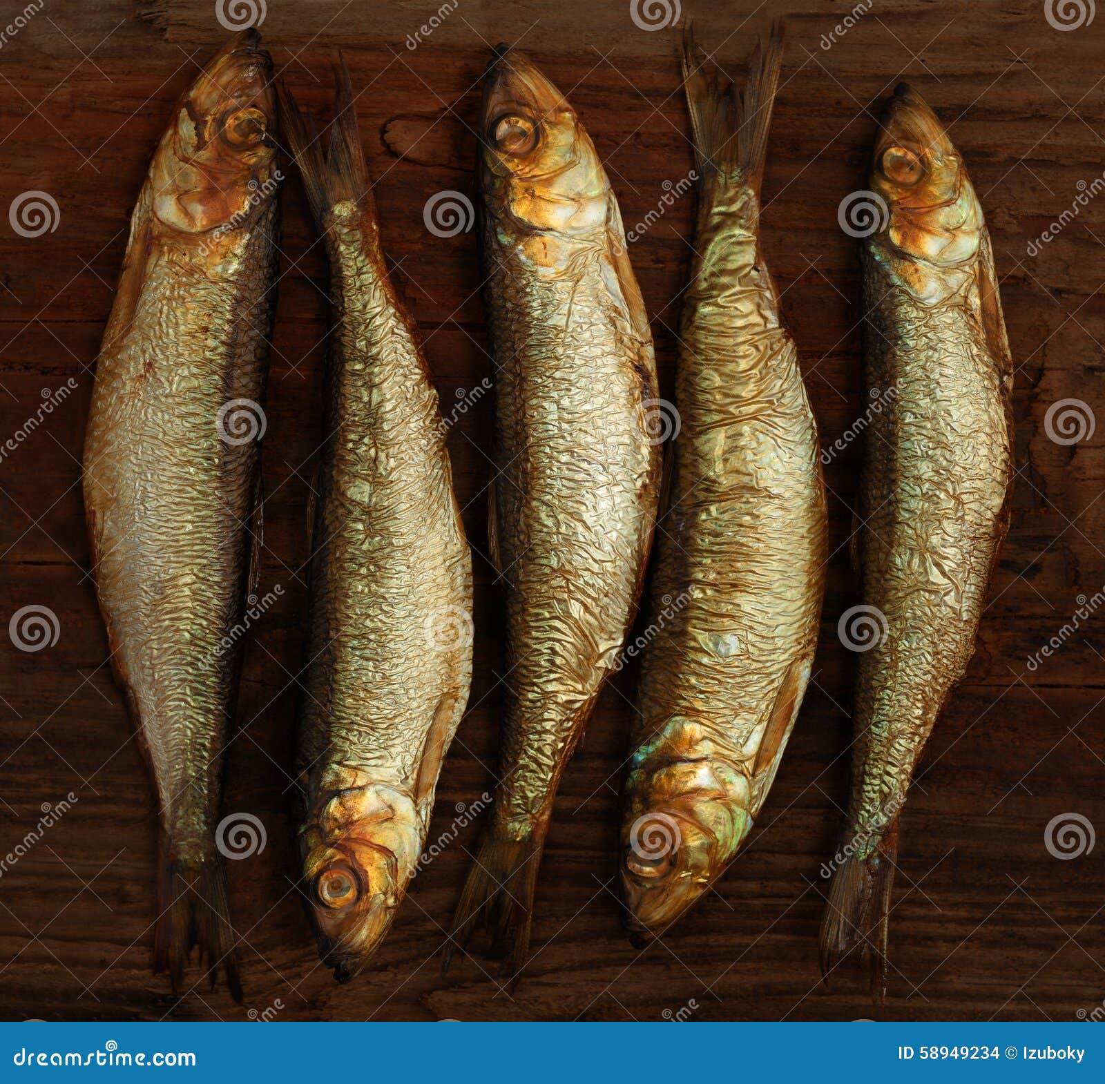 Herring Sprat Fish Smoked on Wooden Table Stock Photo - Image of group ...