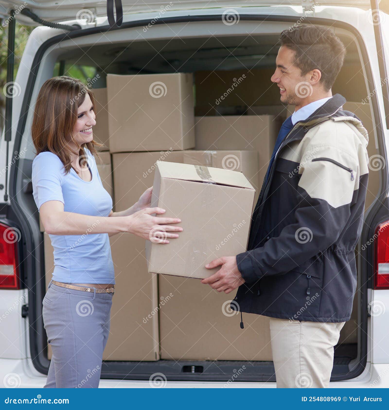 Hes Committed To Great Customer Service. a Delivery Man Making a ...