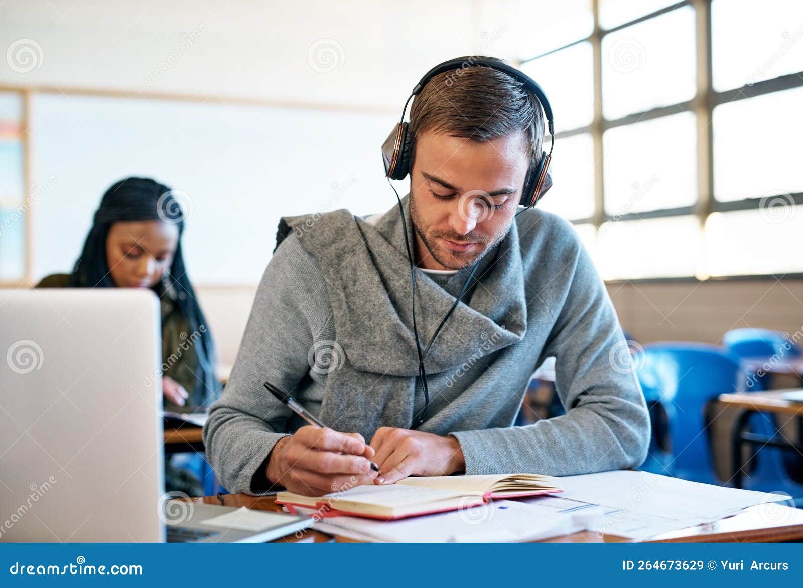 Hes Diligent and Dedicated. a Handsome Young University Student Taking ...