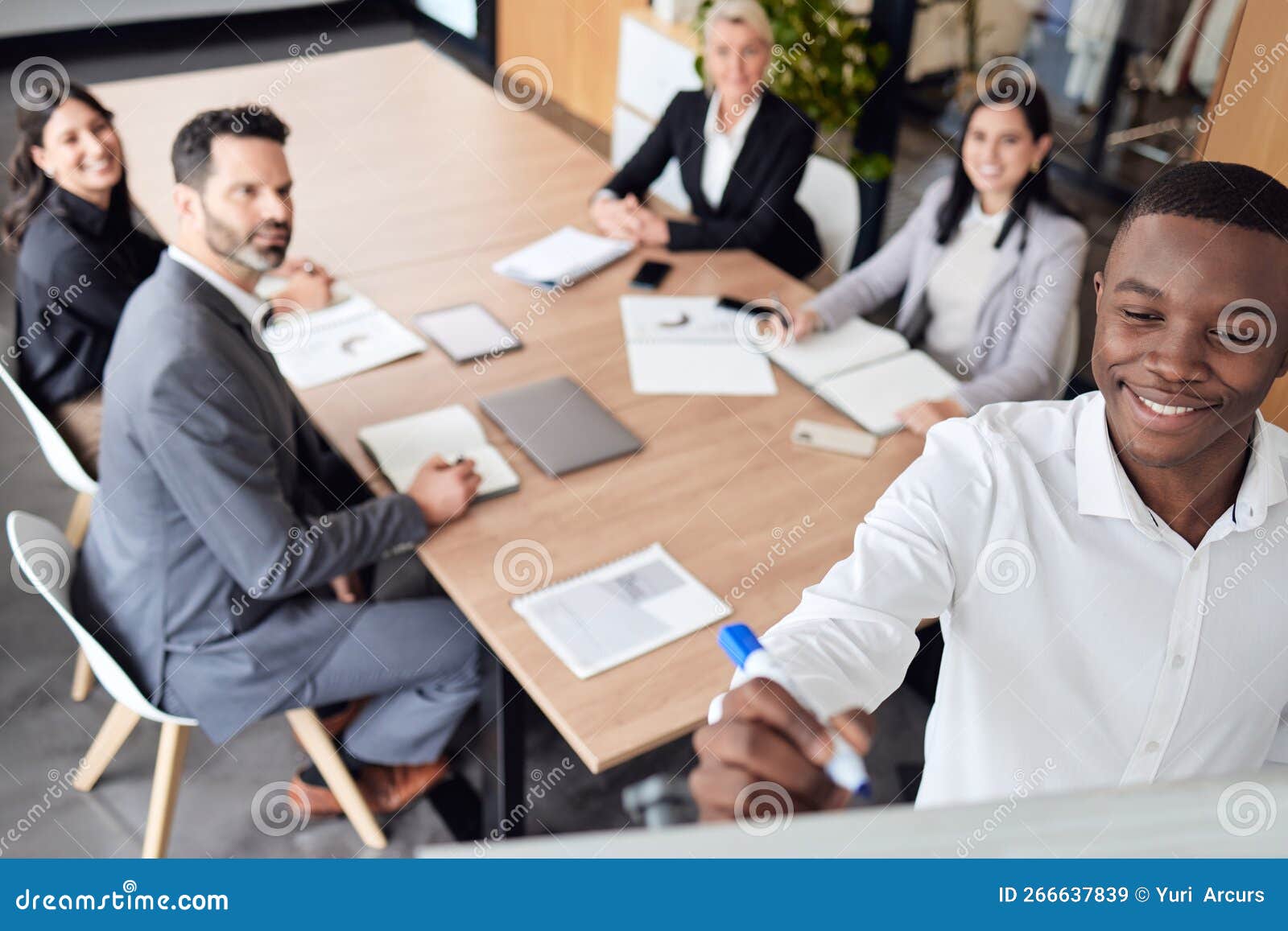 Hes an Expert at this Topic. a Group of Businesspeople Having a Meeting ...