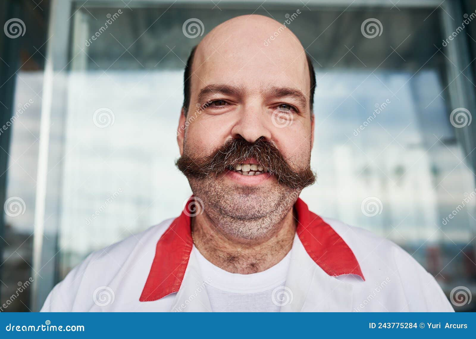 Hes a Friendly Butcher. Shot of a Butcher at His Store. Stock Photo ...