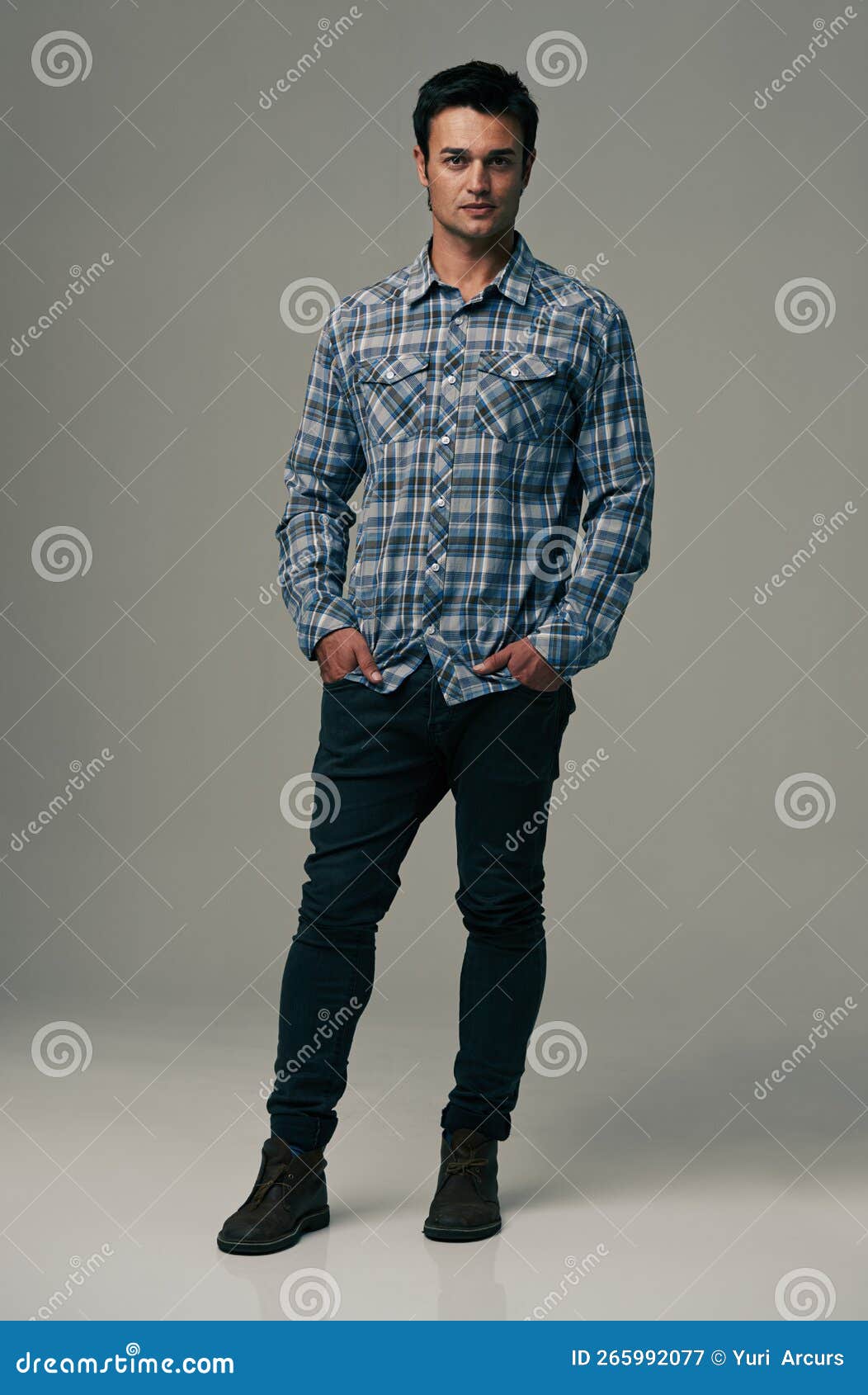 Hes Got the Look. Studio Shot of a Casual Male Looking at the Camera ...