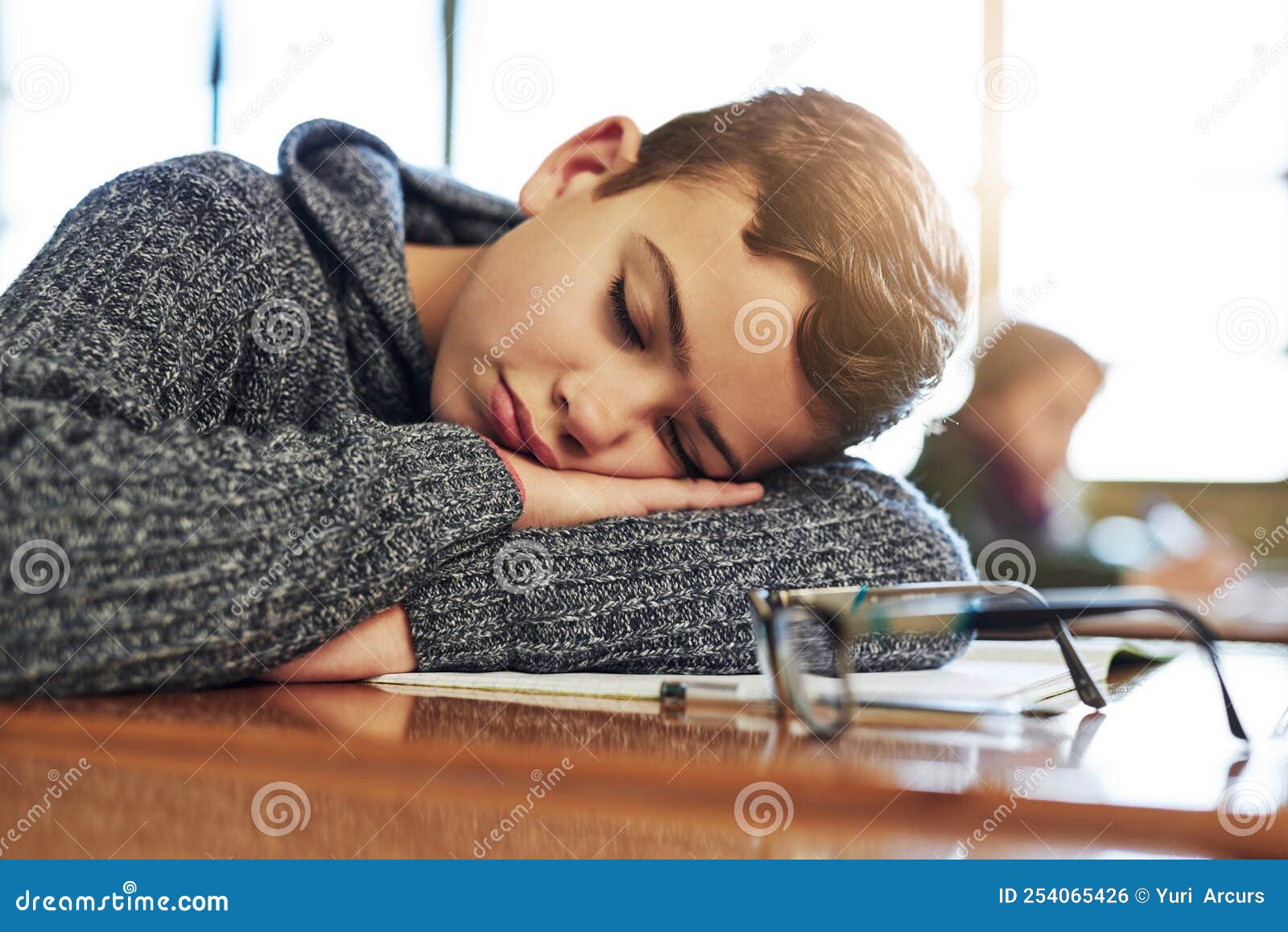 Hes Had a Long Day at School. an Elementary Schoolboy Taking a Nap in ...