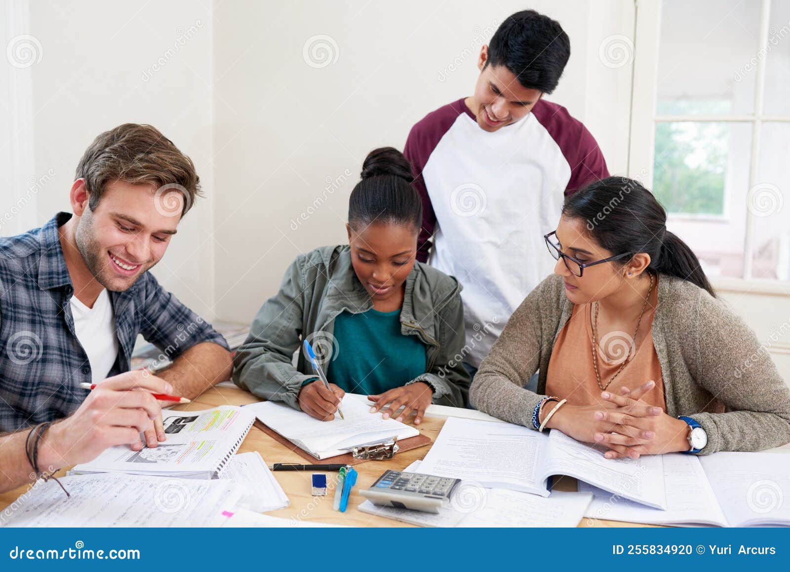 Hes Helping Them Study. a Group of University Students in a Study Group ...