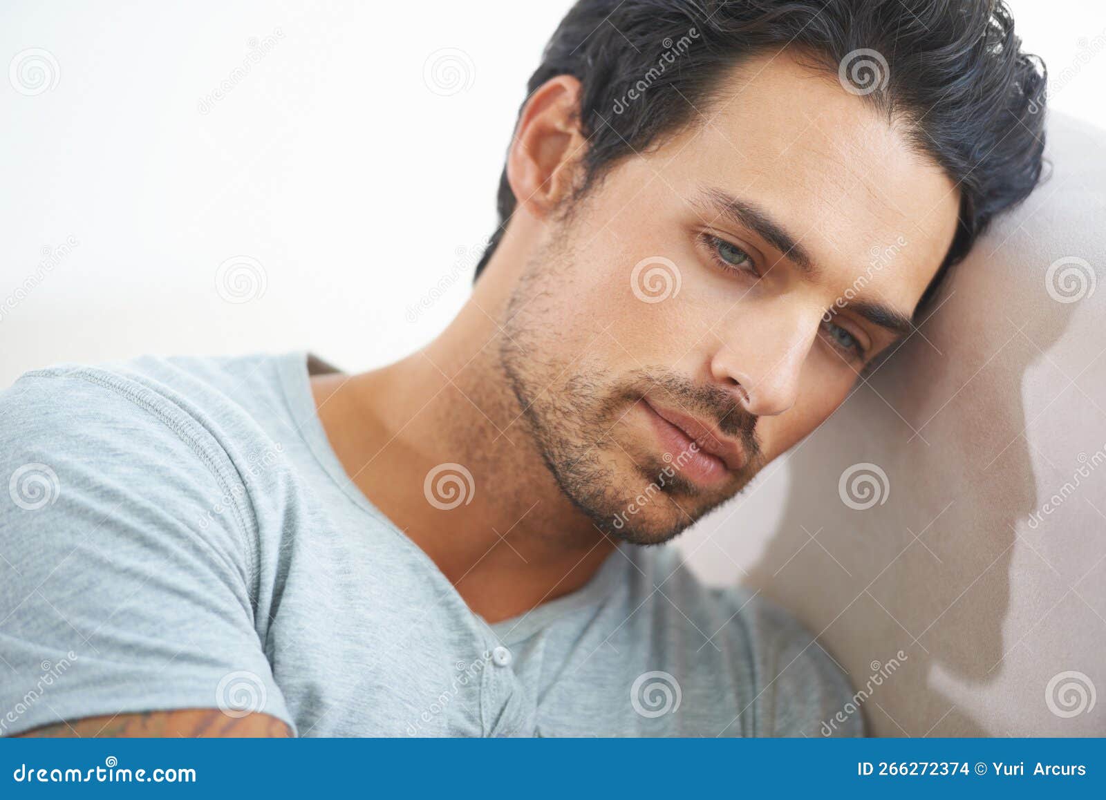 Hes a Man of Mindfulness. a Gorgeous Young Man Resting on a Sofa at ...
