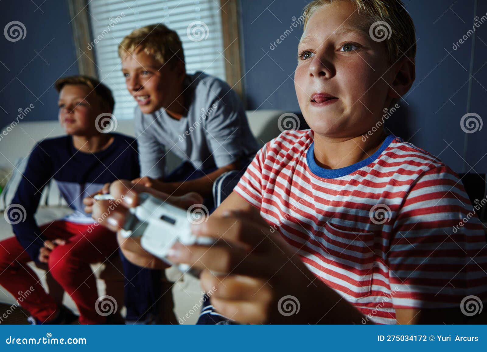 Hes a Master of the Controller. Young Boys Playing Video Games. Stock ...