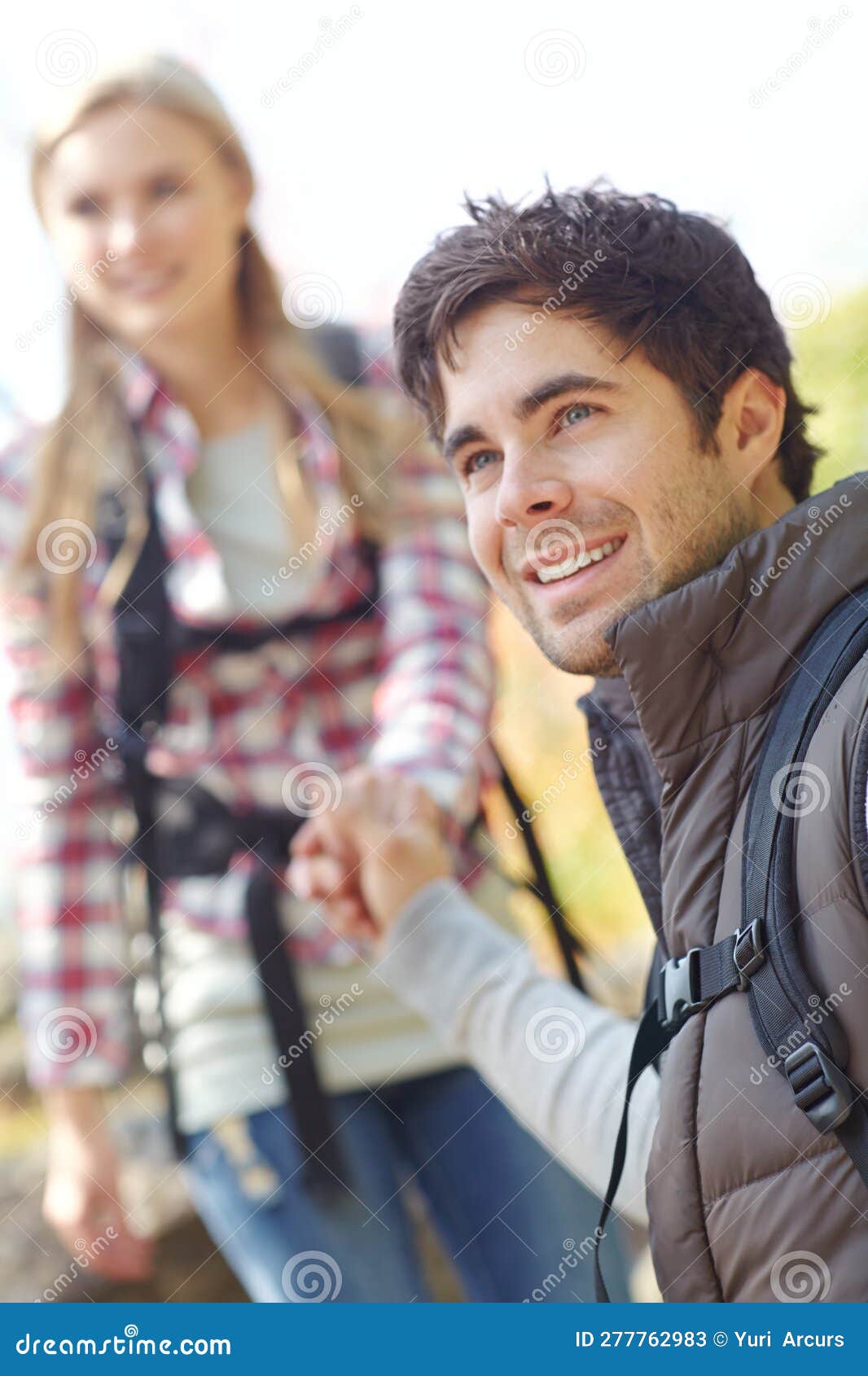 Hes The Perfect Gentleman A Handsome Young Hiker Helping His