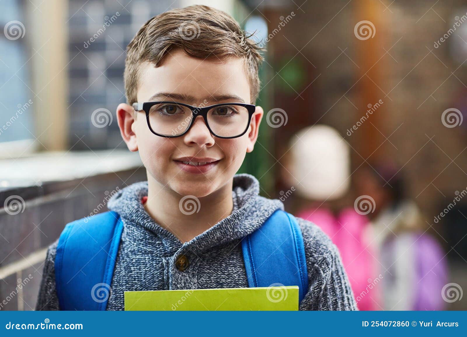 Hes Ready for the Next Class. an Elementary School Boy in the Corridor ...