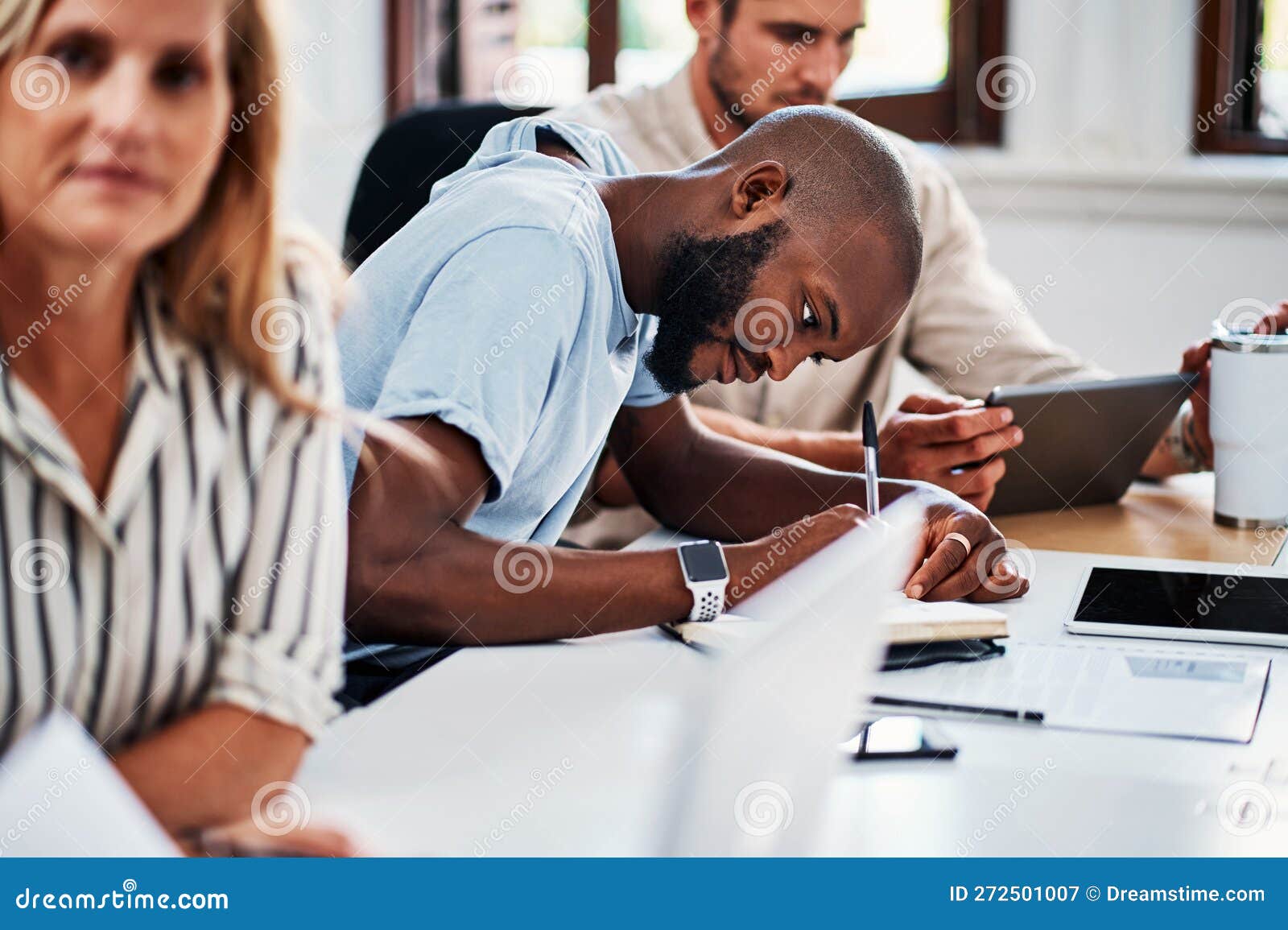 Hes always Taking Notes. a Handsome Young Businessman Taking Notes ...
