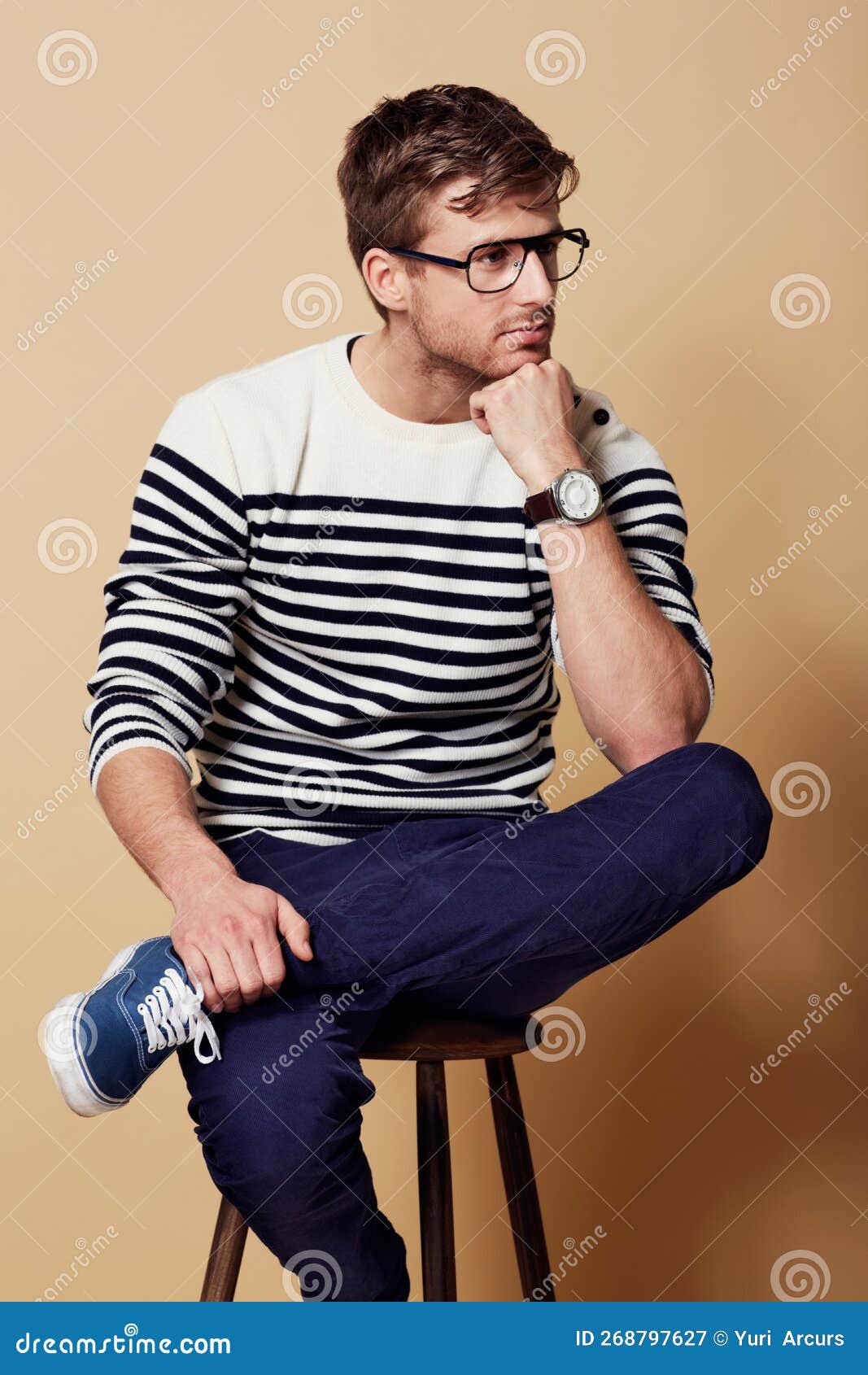 Hes a Thinking Man...Studio Shot of a Thoughtful-looking Young Man ...