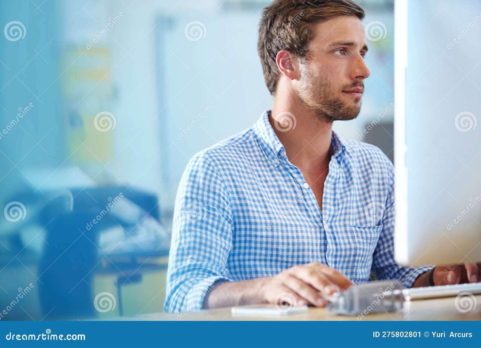 Hes Working on His New Project. a Designer at Work on a Computer in an ...