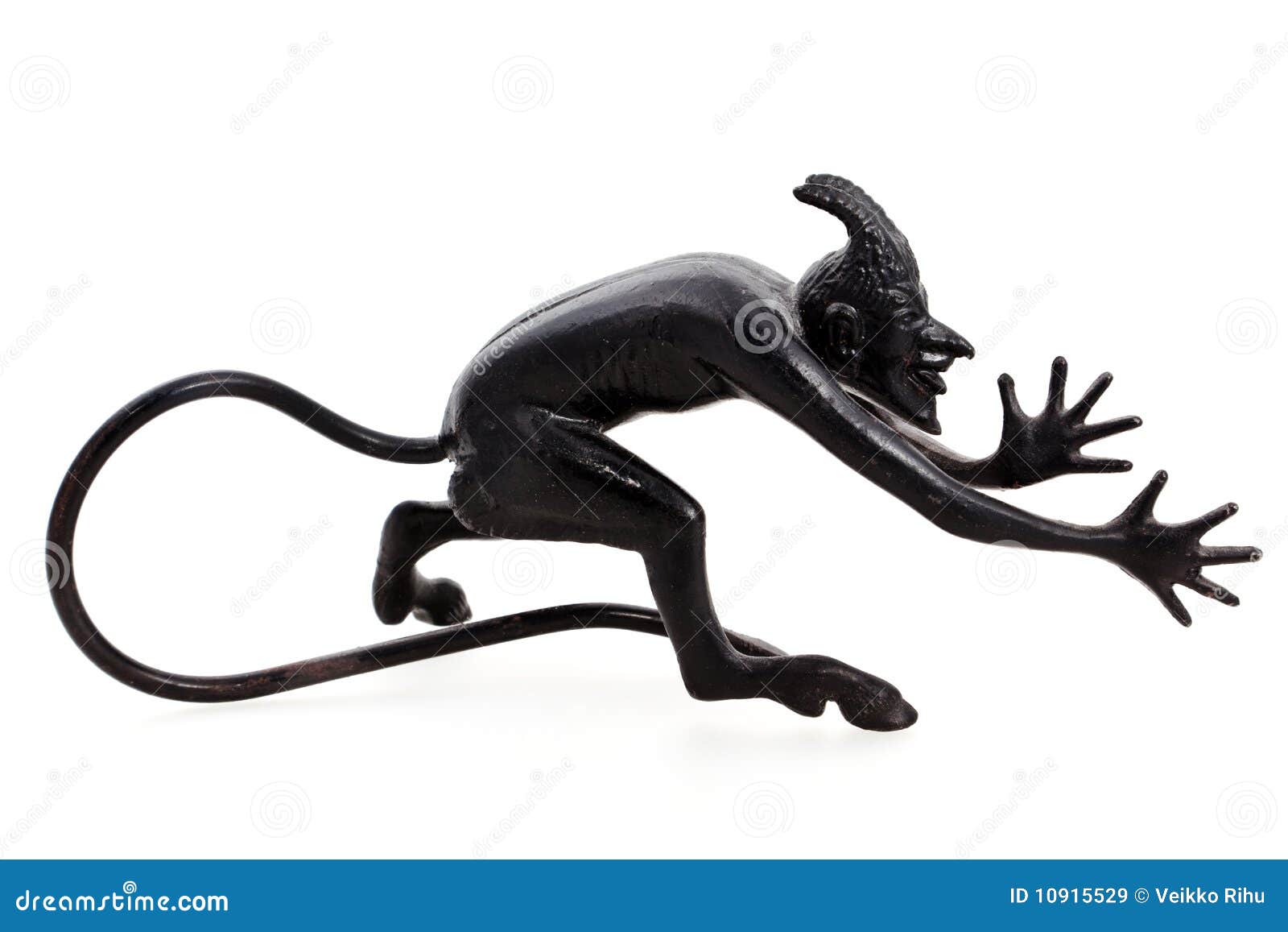 Het beeldje van de duivel stock afbeelding. Image of juffer - 10915529