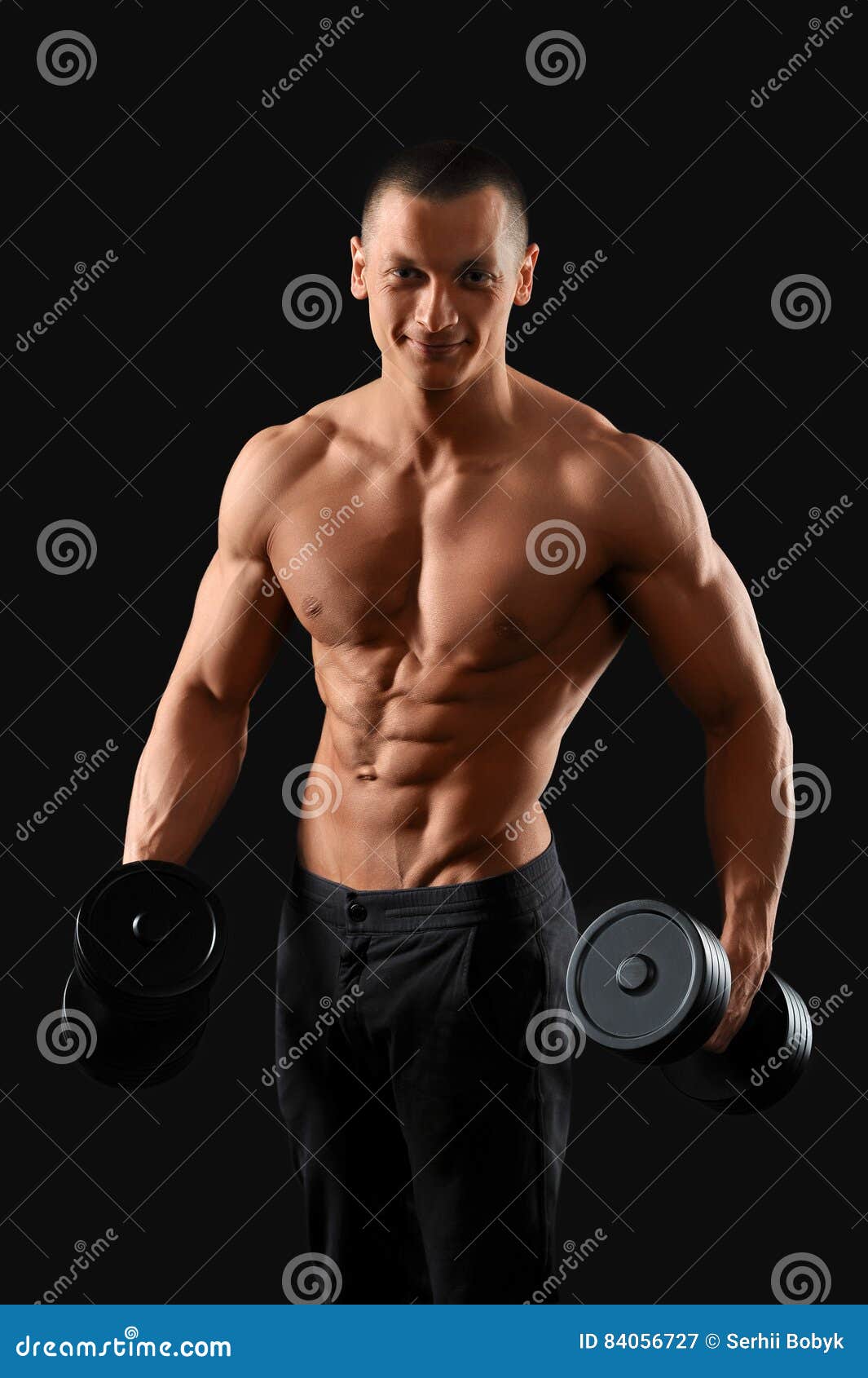 Het Mannelijke Bodybuilder Stellen in Studio Stock Afbeelding - Image ...