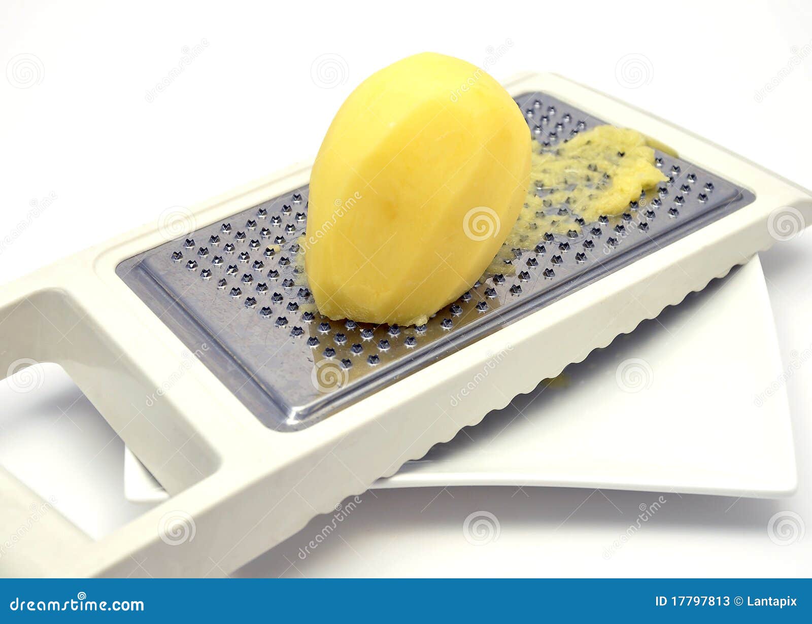 Het Raspen Van De Aardappel Stock Afbeelding - Image of achtergrond ...