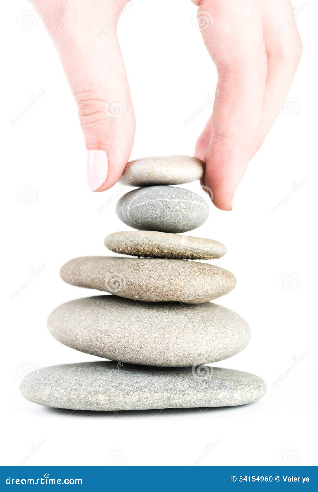 Het stapelen van Stenen stock foto. Image of vinger, wijfje - 34154960
